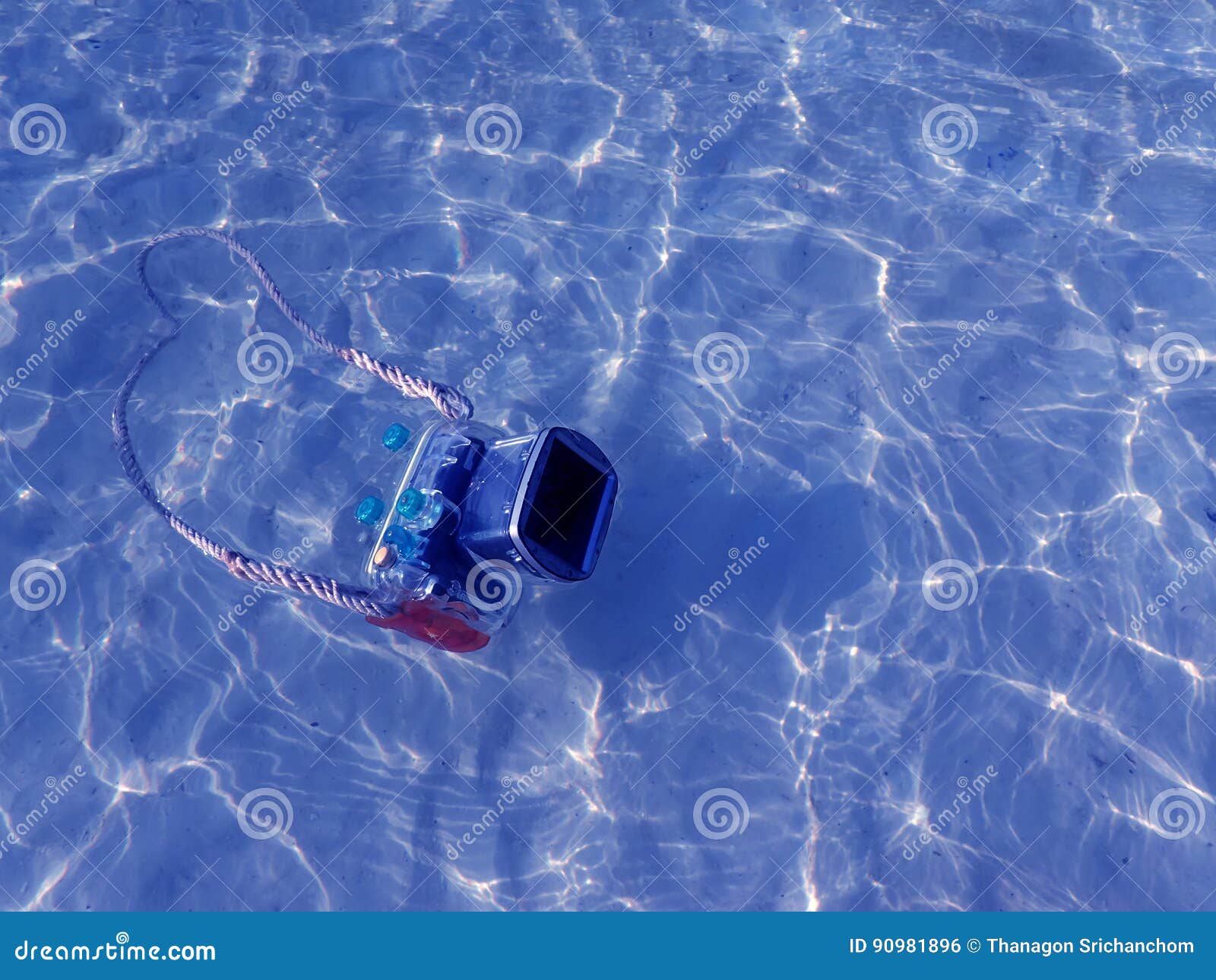 Compact Camera and Housing Floating on the Sea. Stock Photo - Image of ...