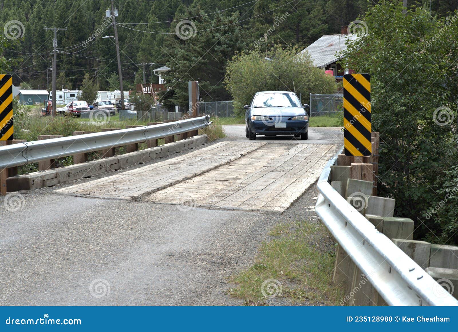 A Compact Car Crosses a One-lane Bridge Stock Photo - Image of compact ...