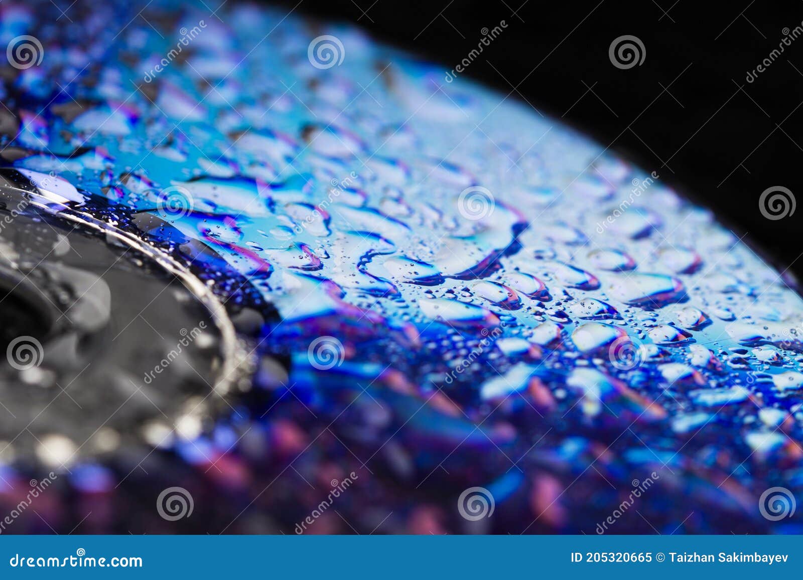 Compact Disc CD with Water Drops and Shiny Colorful Reflection ...