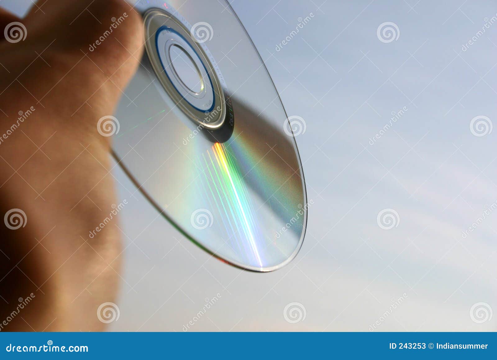 Compact Disc Close-up Against the Sky Background Stock Image - Image of ...