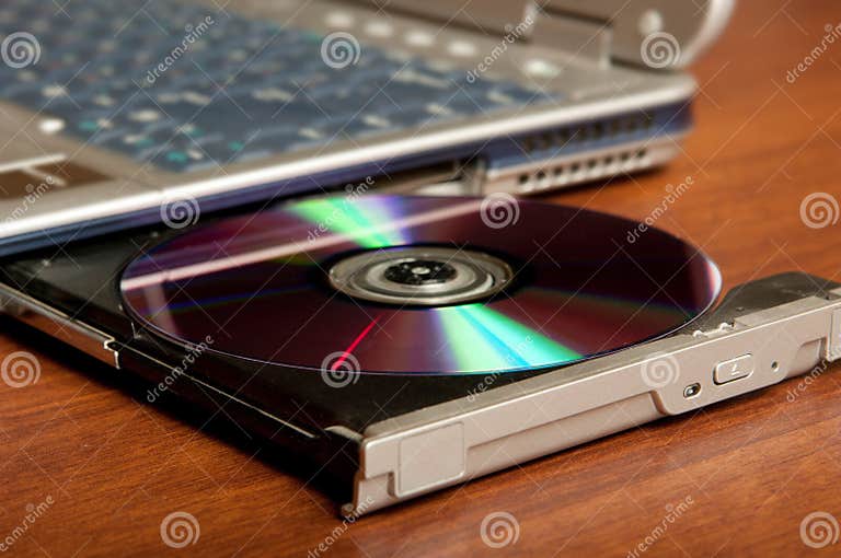Compact disc on drive stock image. Image of laptop, backup - 15882375