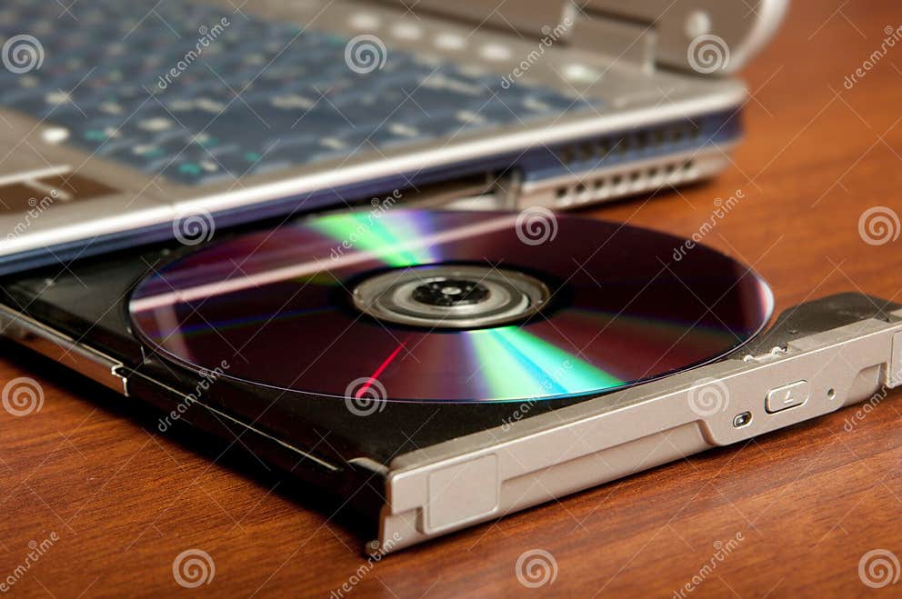 Compact disc on drive stock image. Image of laptop, backup - 15882375