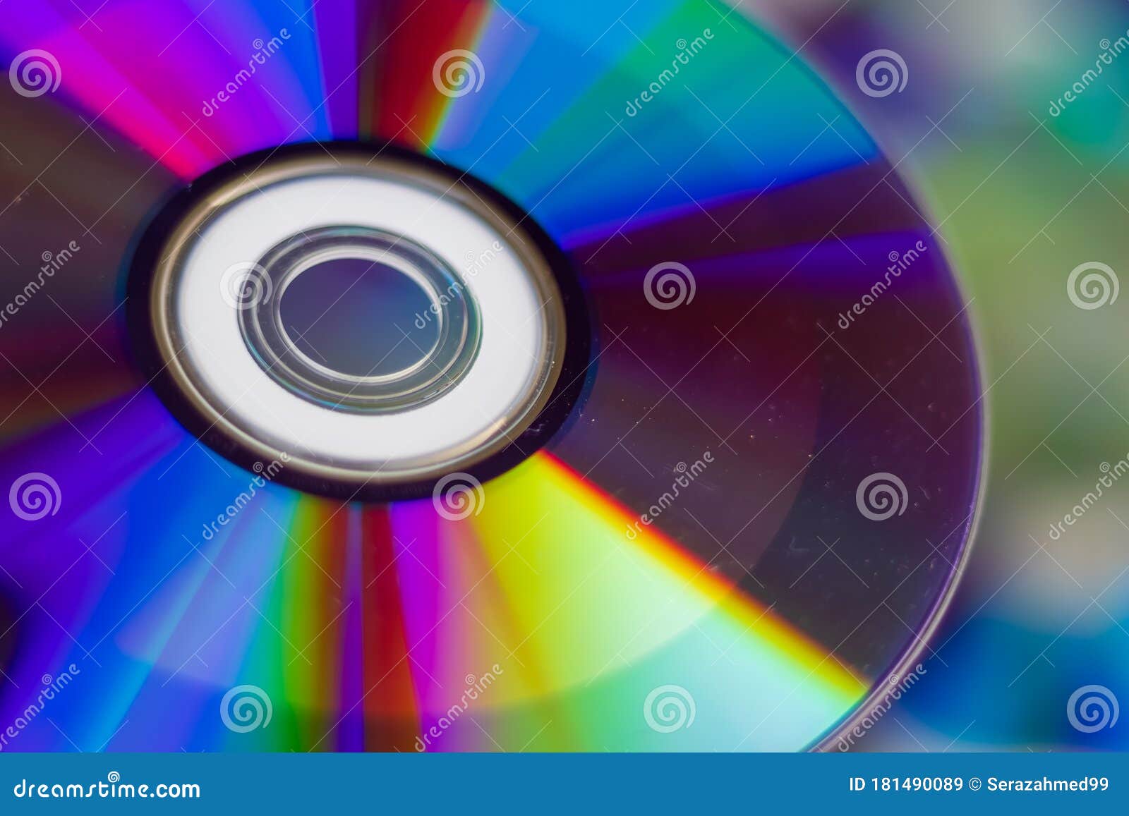 Compact Disc. Holding a CD in Hands. the Back Side of the CD Reflects ...
