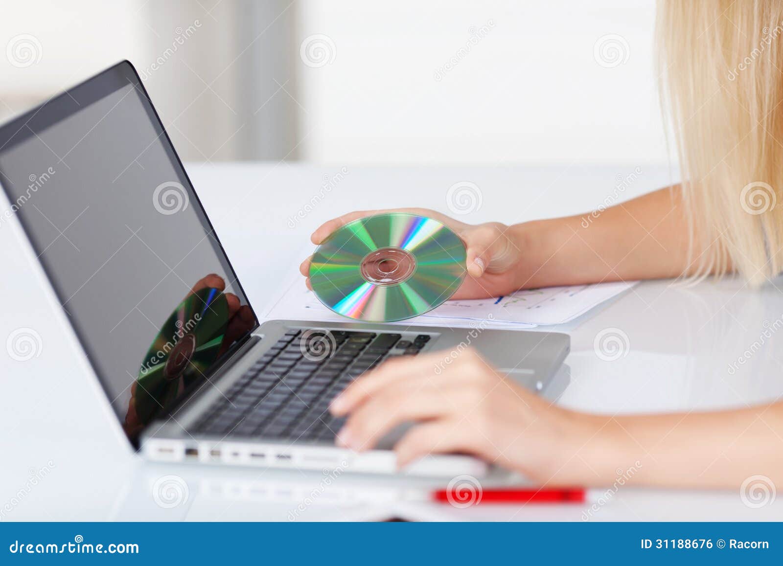 Compact disc and laptop stock photo. Image of holding - 31188676