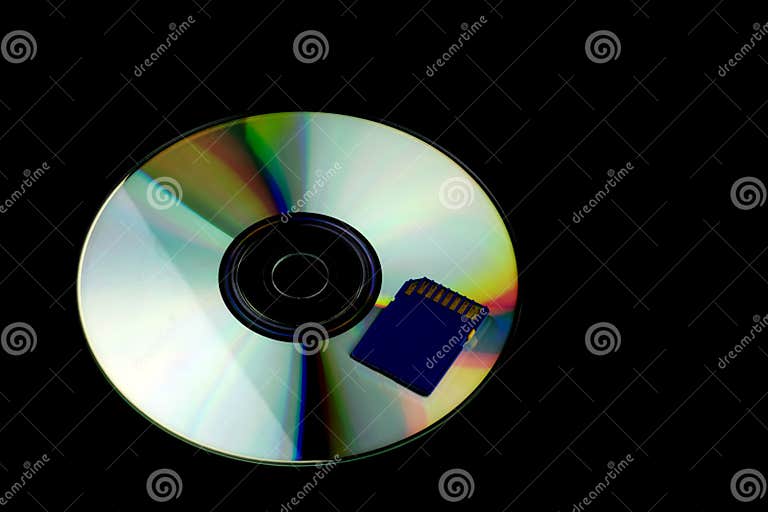 Compact Disc and Memory Card on a Black Background Stock Photo - Image ...