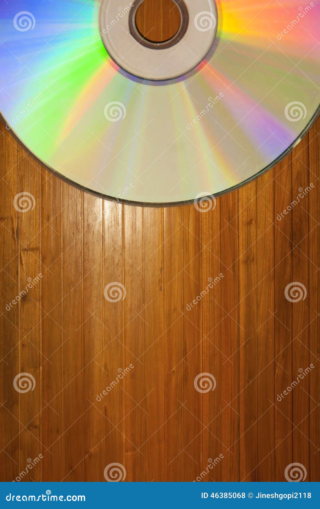 Compact Disc on a Wooden Table Stock Photo - Image of disk, burn: 46385068