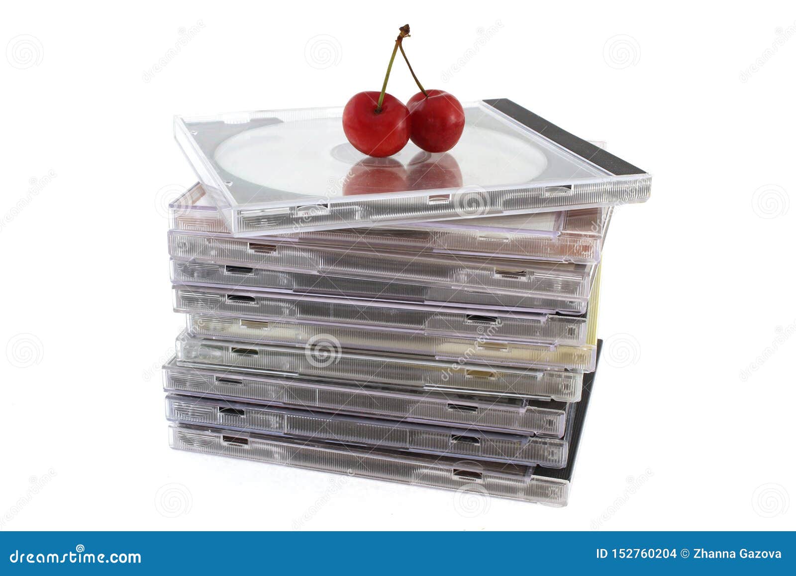 Compact Discs in Packs with Two Cherries on Top, Close-up Stock Photo ...