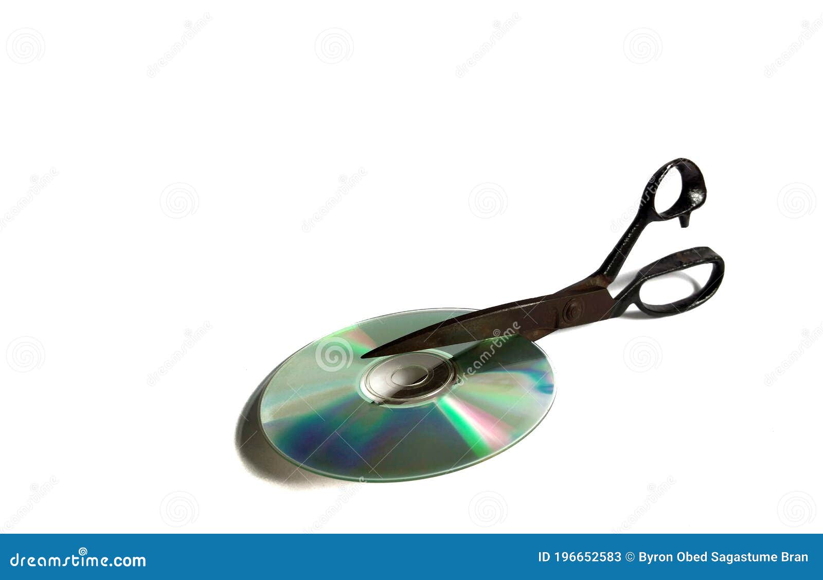 Compact Disk Cut by Scissors on White Background. Obsolete Technology ...