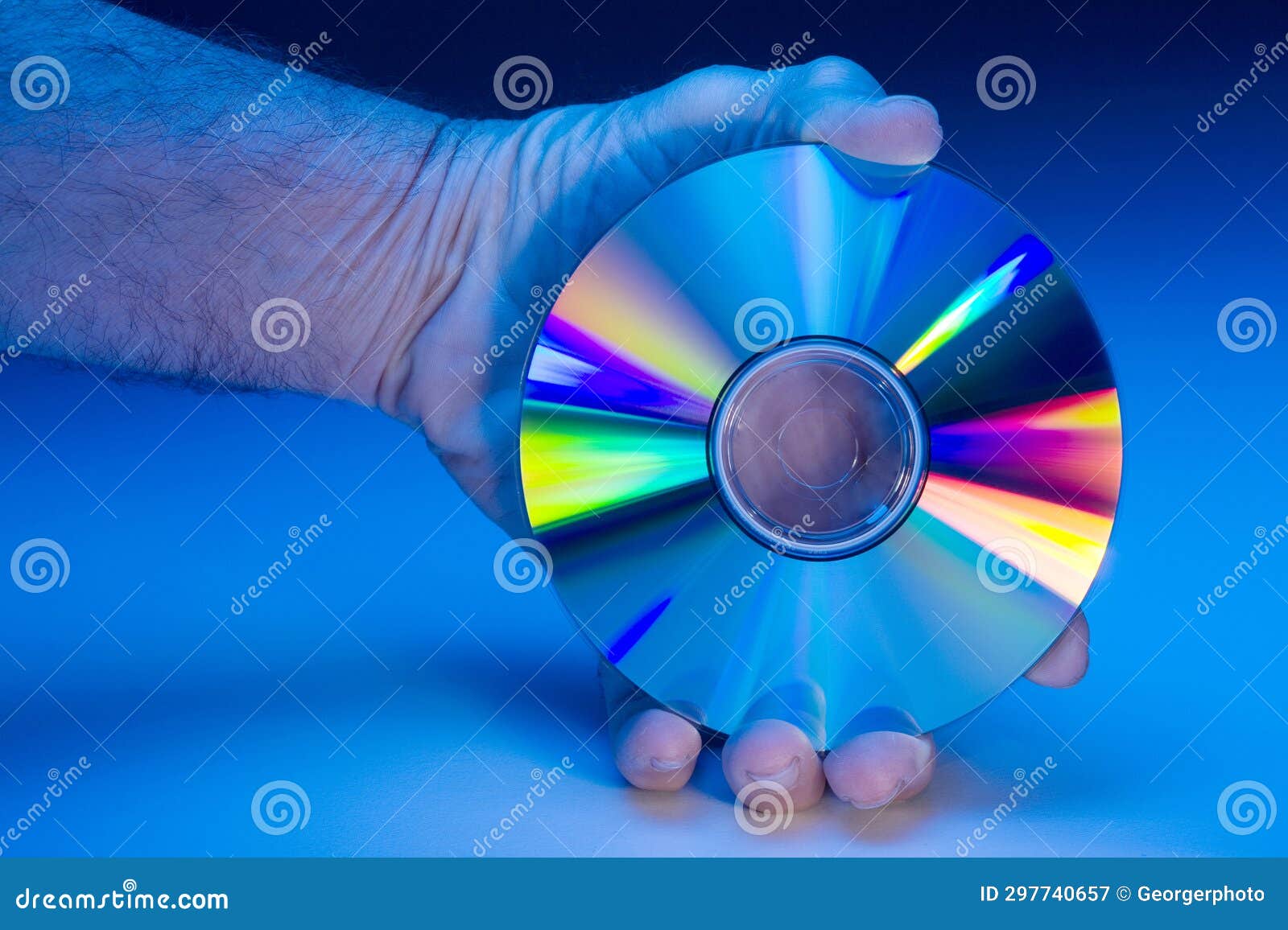 Compact Disk stock image. Image of hold, hand, tech - 297740657