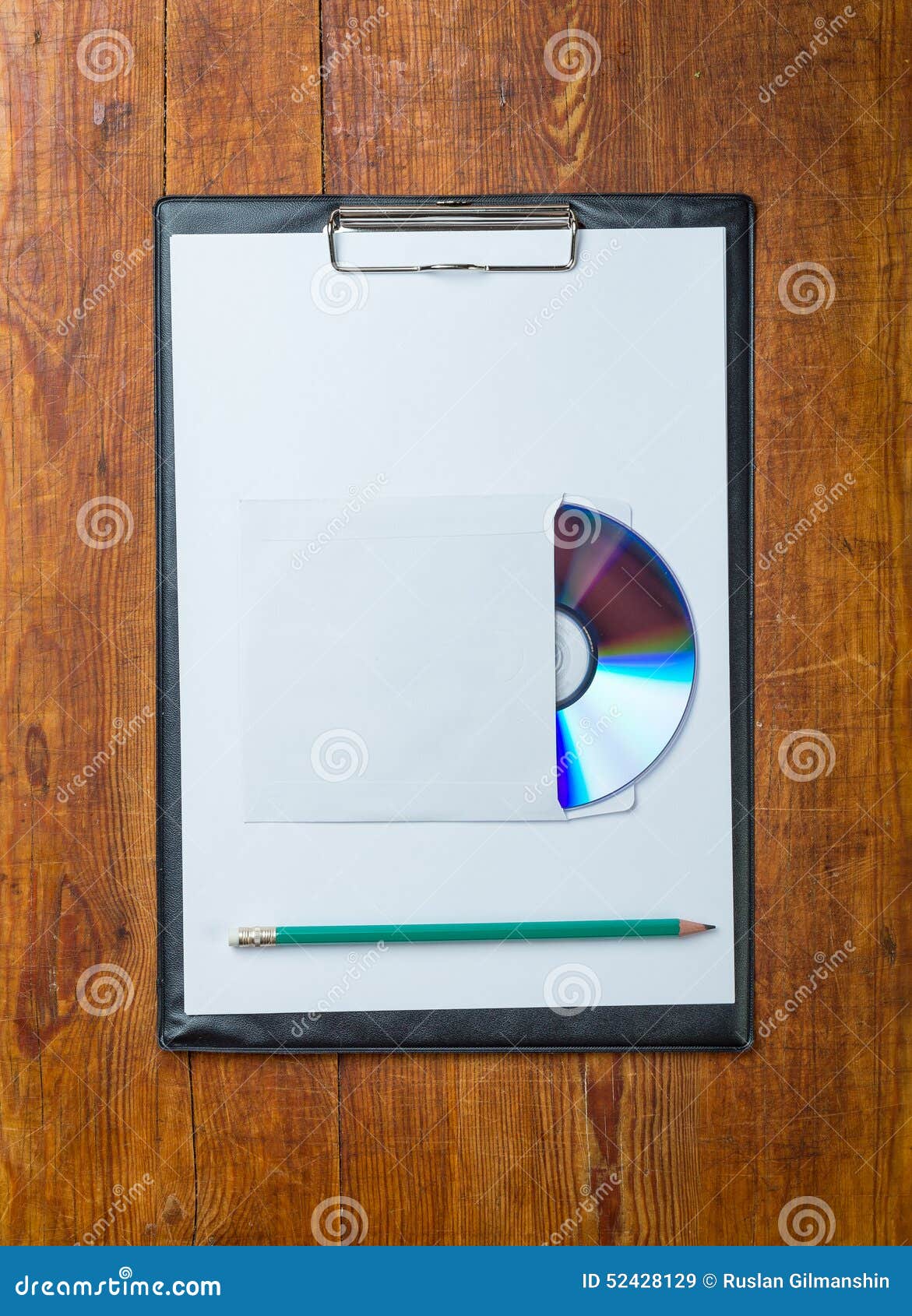 Compact disk on a table stock image. Image of layout - 52428129