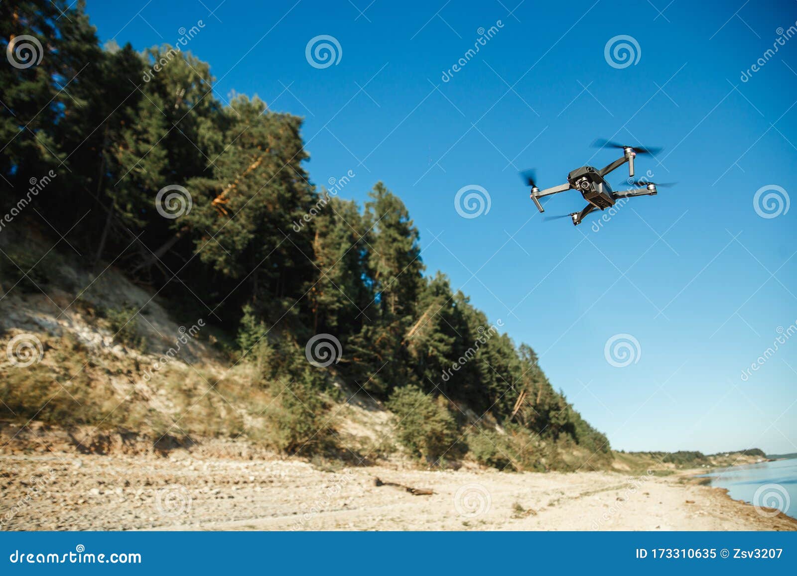 Compact Drone Flying Over the Forest Landscape Stock Image - Image of ...