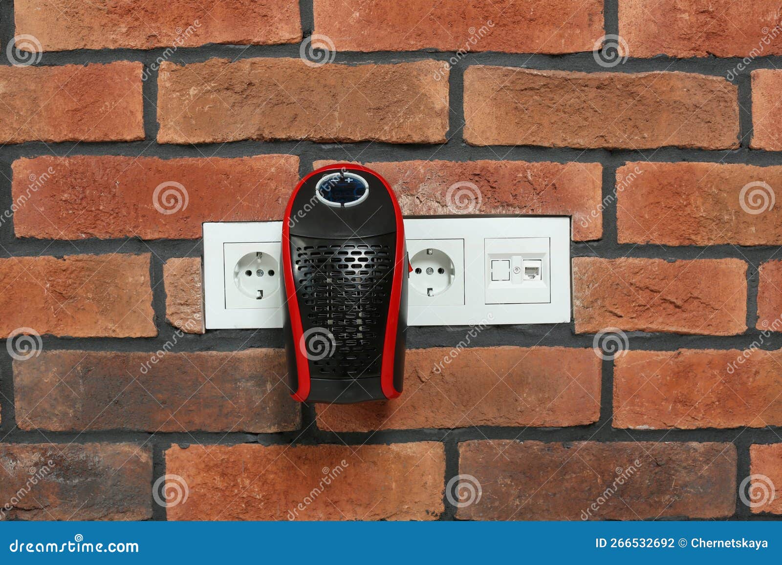 Compact Electric Heater Charging from Socket Indoors Stock Photo ...