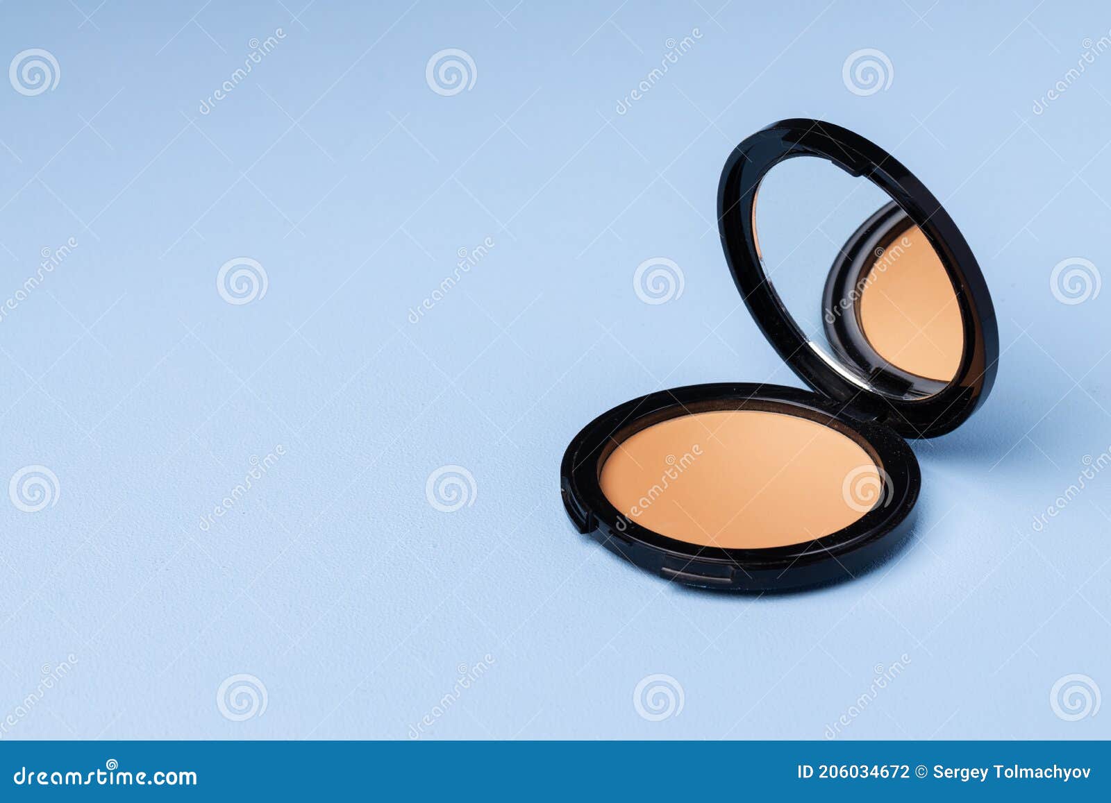 Compact Face Powder on Blue Background Front View Stock Photo - Image ...