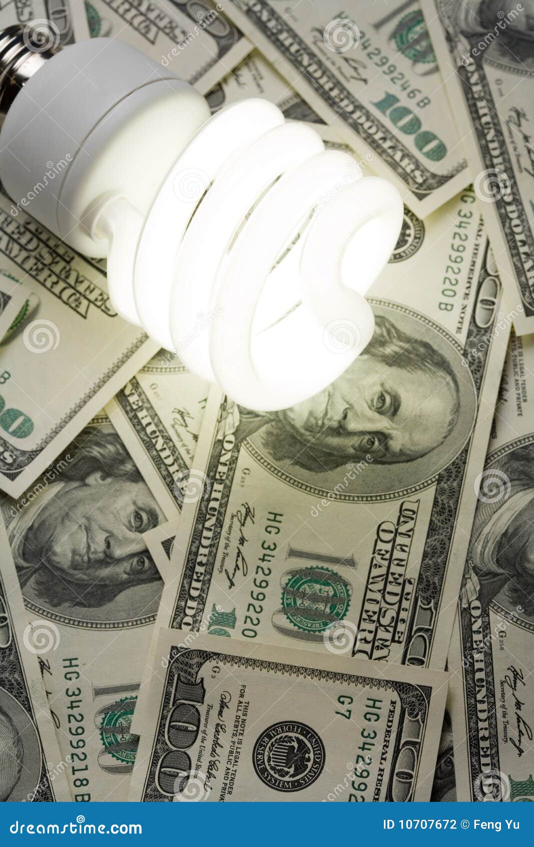Compact Fluorescent Light Bulb and Dollar Stock Photo - Image of bulb ...