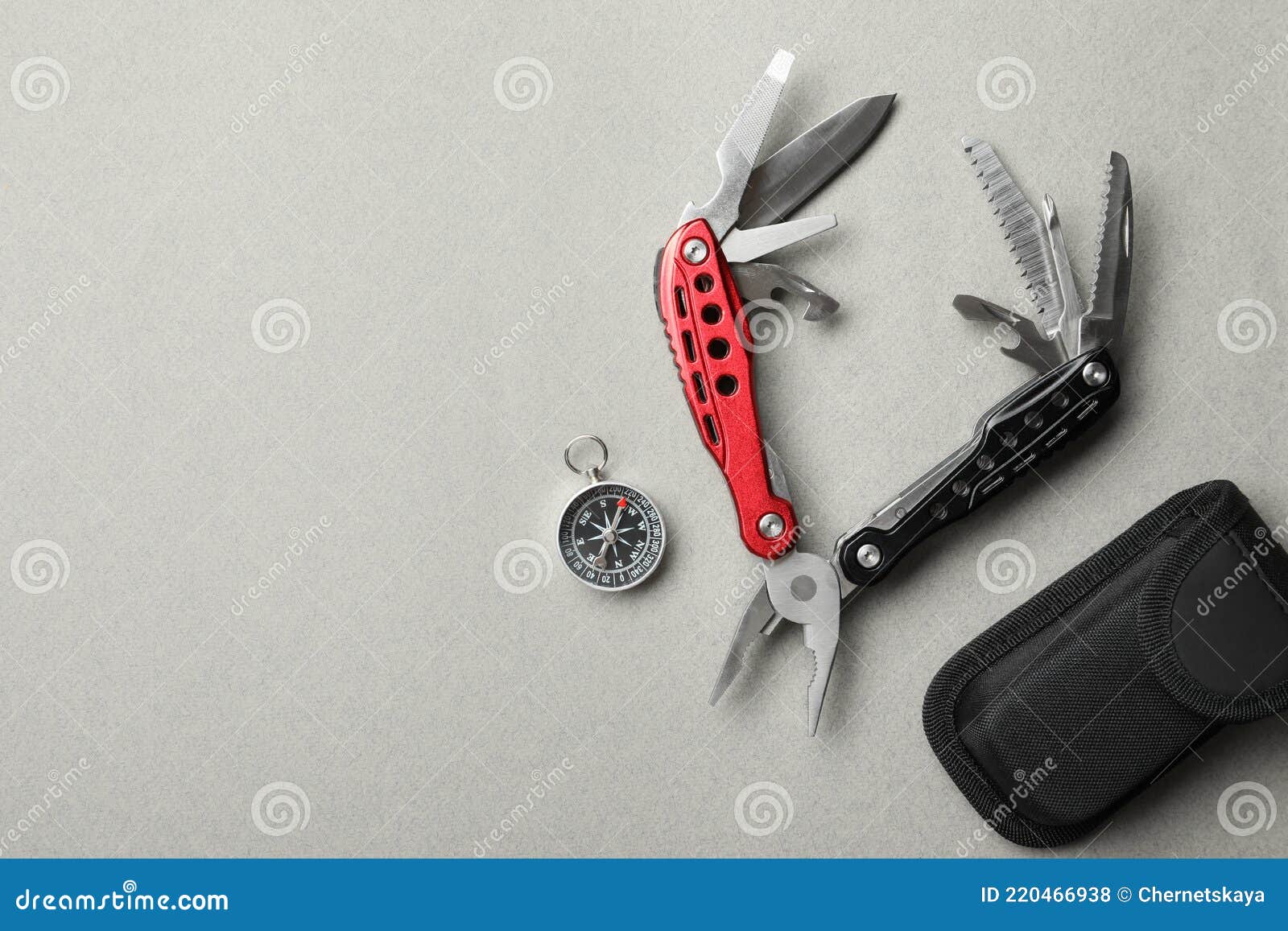 Compact Portable Multitool, Case and Compass on Light Grey Background ...