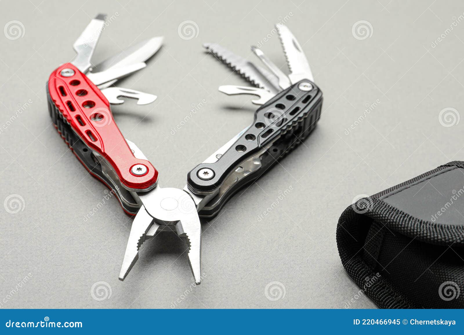 Compact Portable Multitool and Case on Light Grey Background, Closeup ...