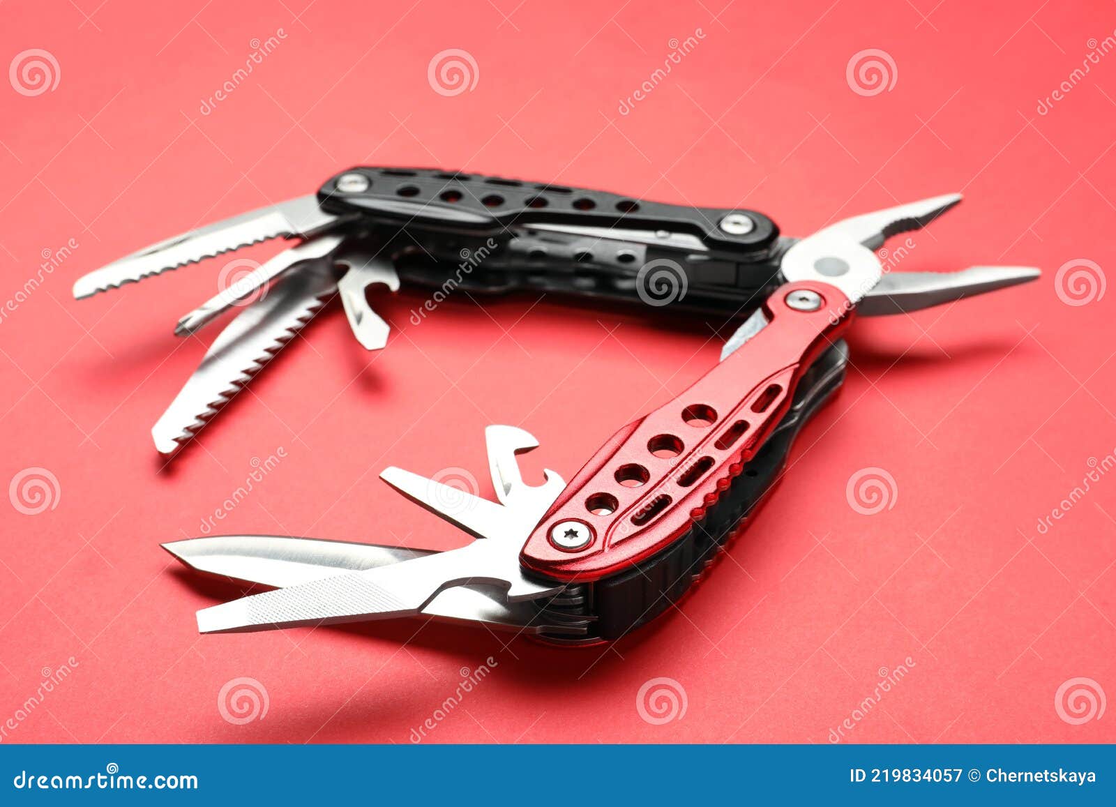 Compact Portable Multitool on Red Background, Closeup Stock Image ...
