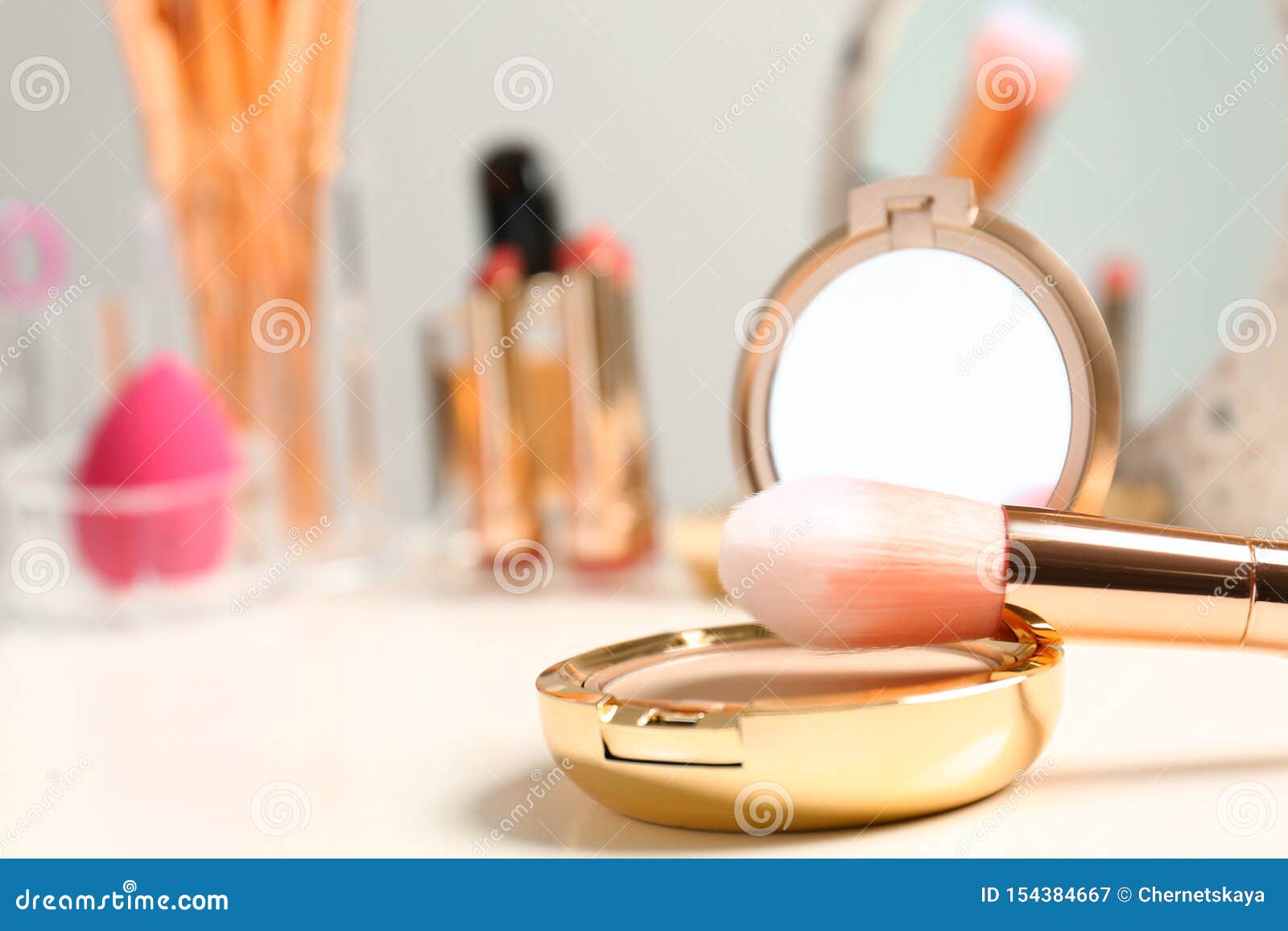 Compact Powder and Makeup Brush on Dressing Table. Space for Stock ...