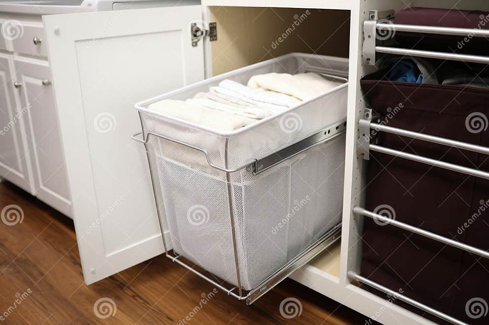 Compact Pull-out Hamper in a Closet Stock Photo - Image of household ...