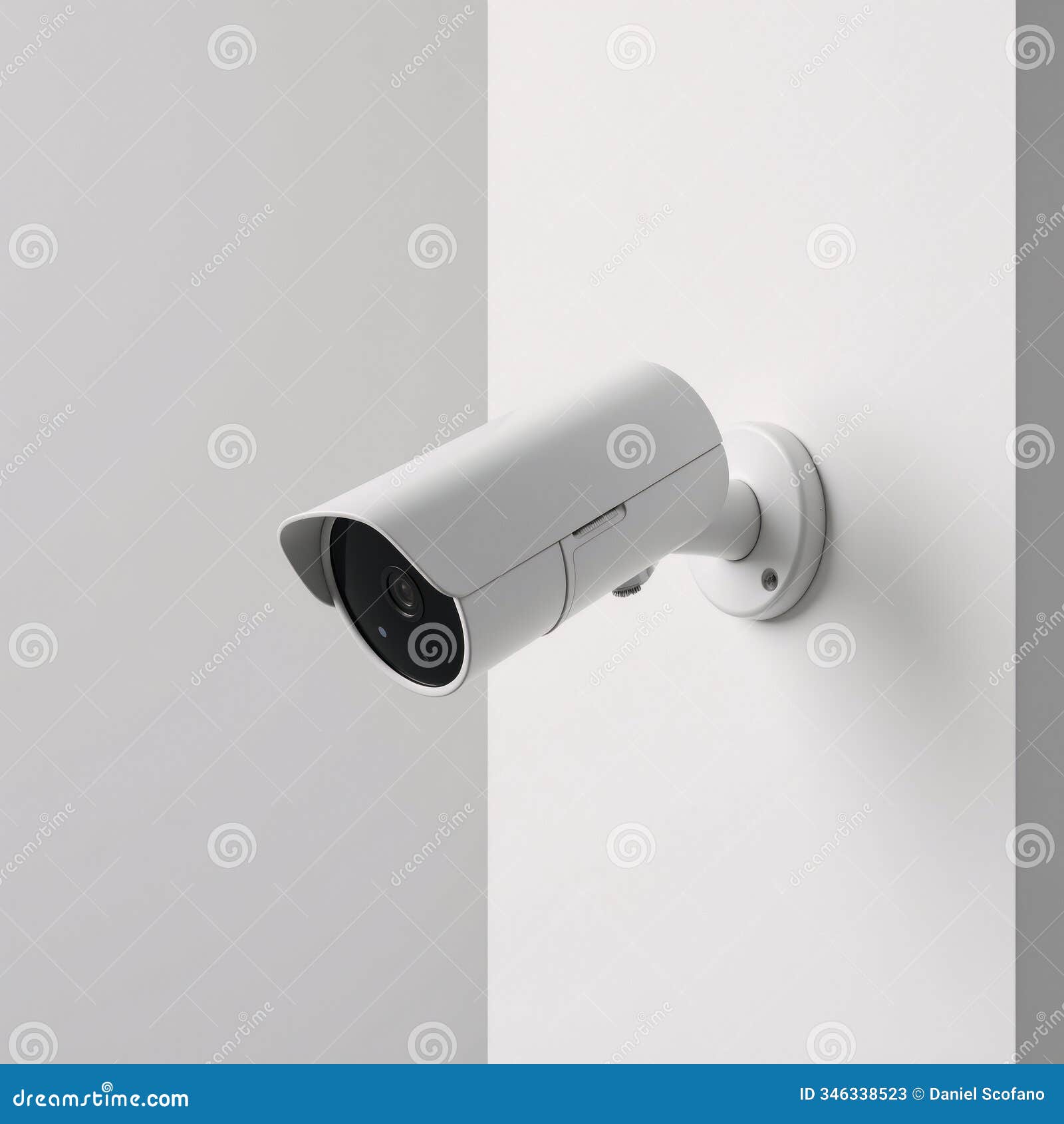 Compact Security Camera on White Wall Ideal for Surveillance Systems ...