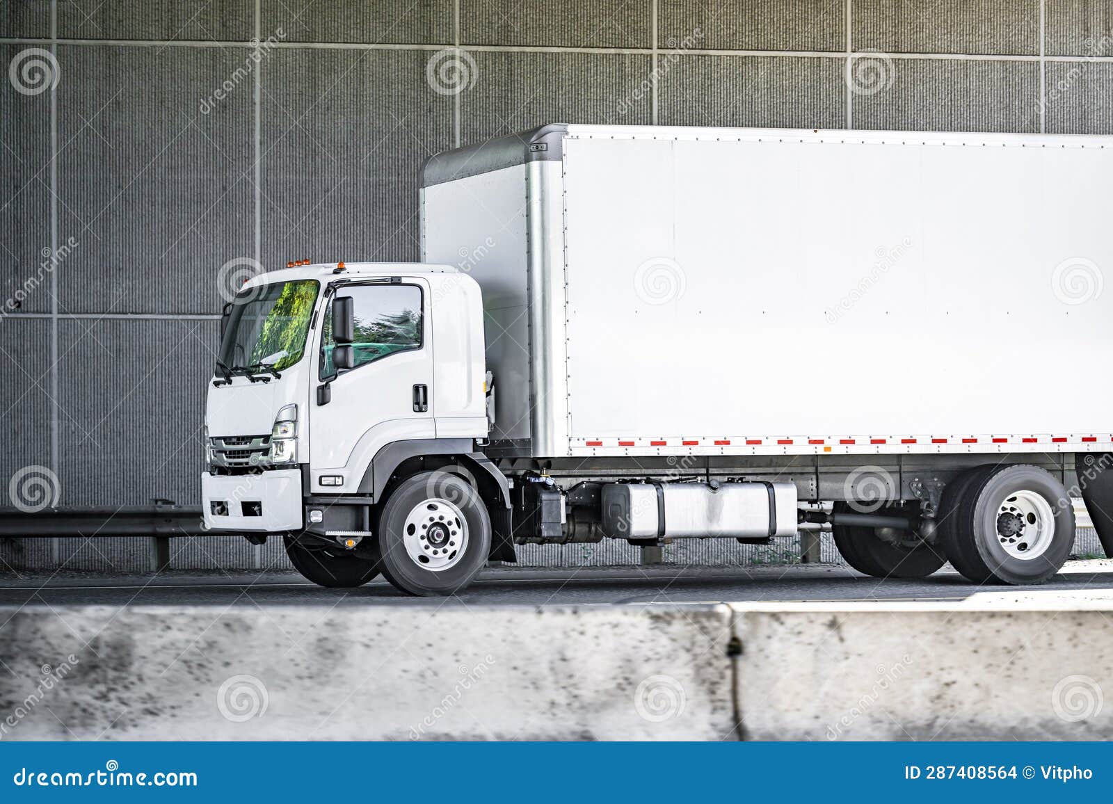 Old Cab Over Big Rig Semi Truck Transporting Container Turning On The ...