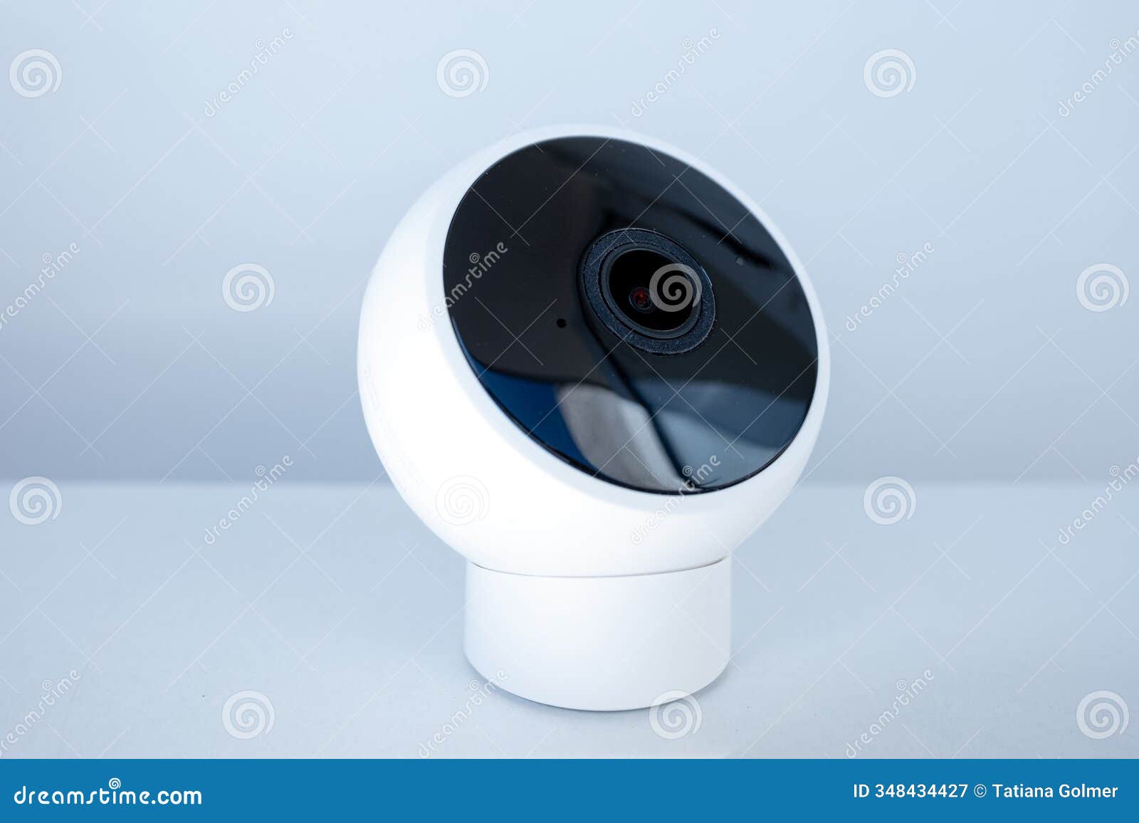Compact Spherical Small Security Camera with Sleek Design Against White ...