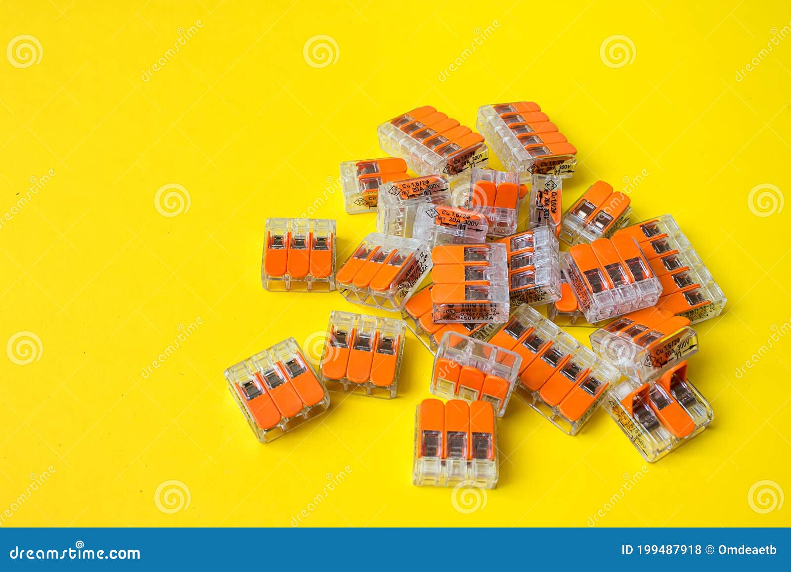 Compact Splicing Connectors on Yellow Background. Electronic Components ...