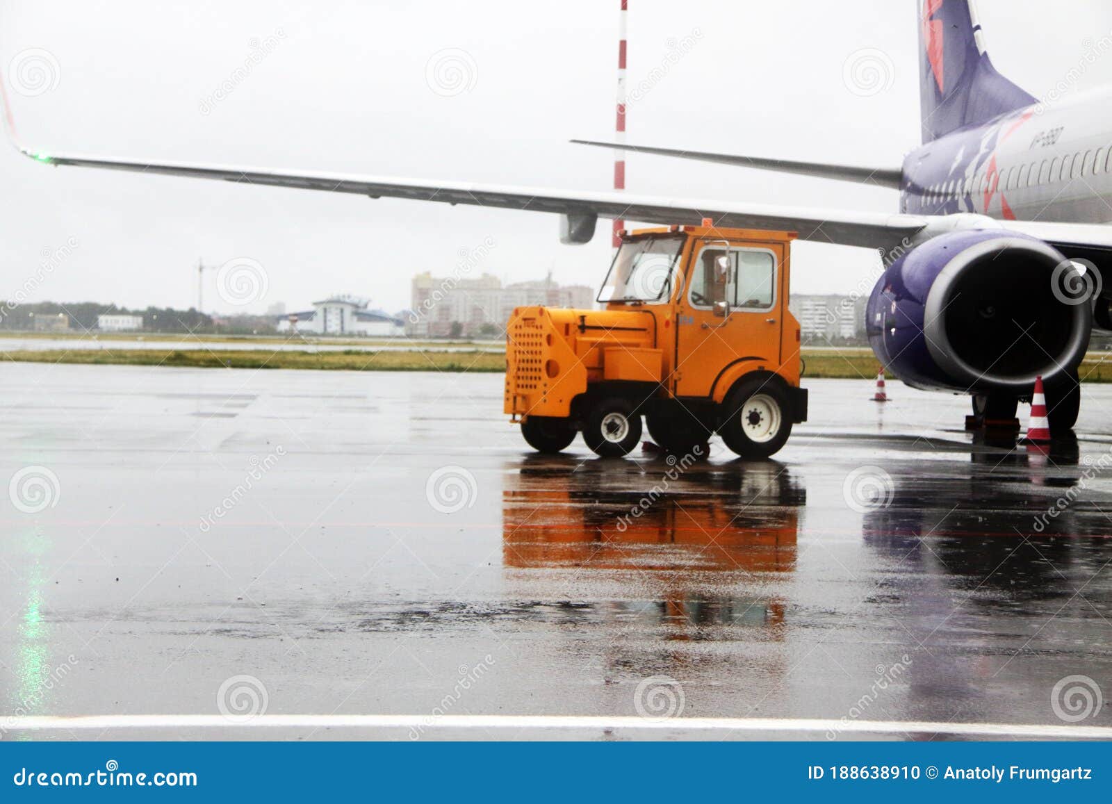 Compact Utility Tractor on the Flying Field of an Airport Editorial ...