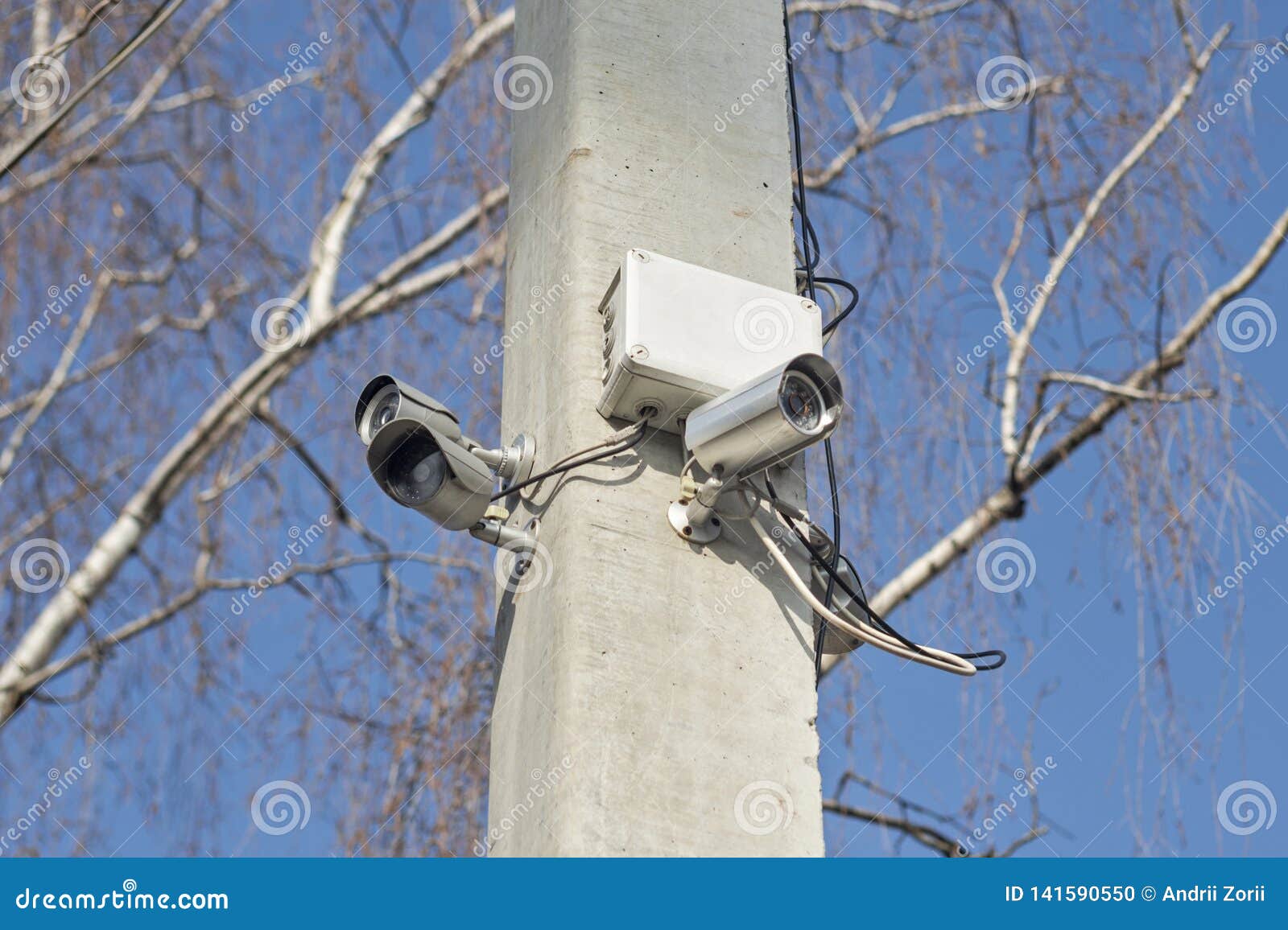 Compact Video Surveillance Cameras on Support Post in Public Areas on ...