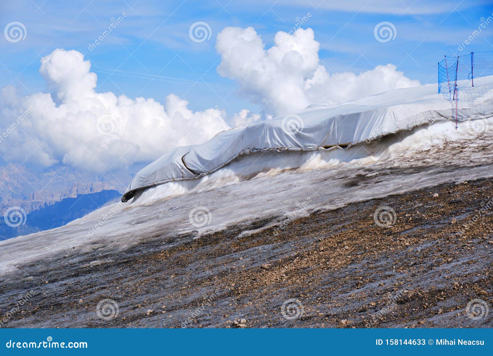 Compacted Snow Protected with White Sheets Against Melting, Under the ...