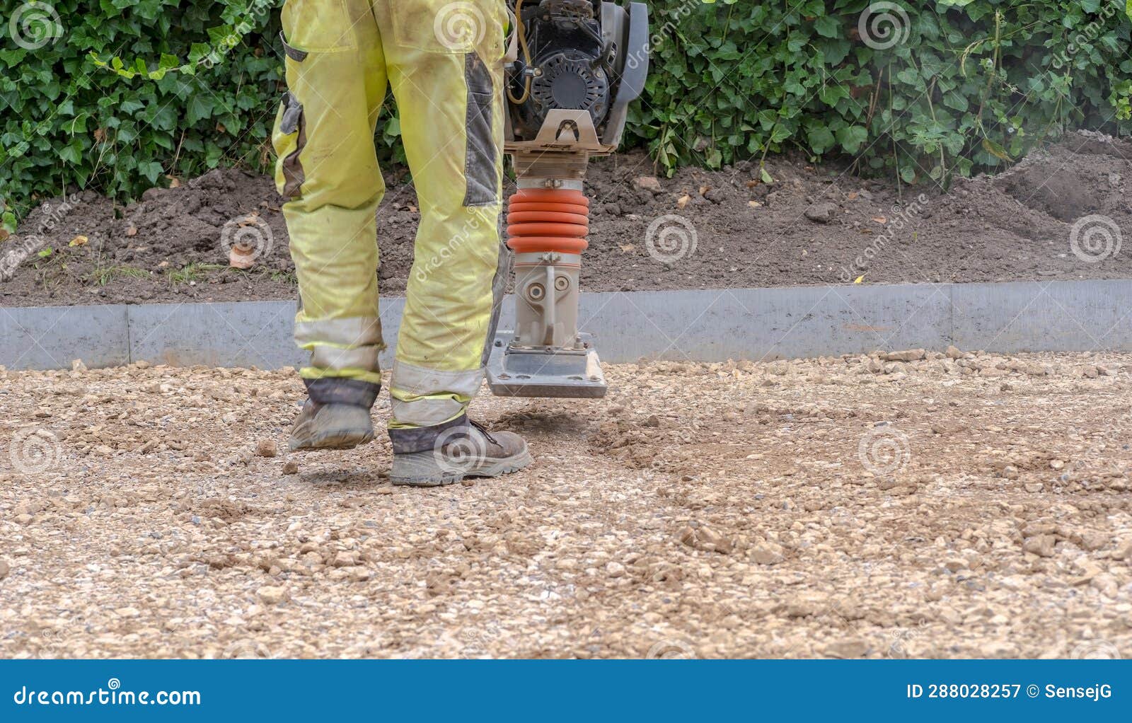 Compacting the Foundation with the Jumper Compactor. Stock Image ...