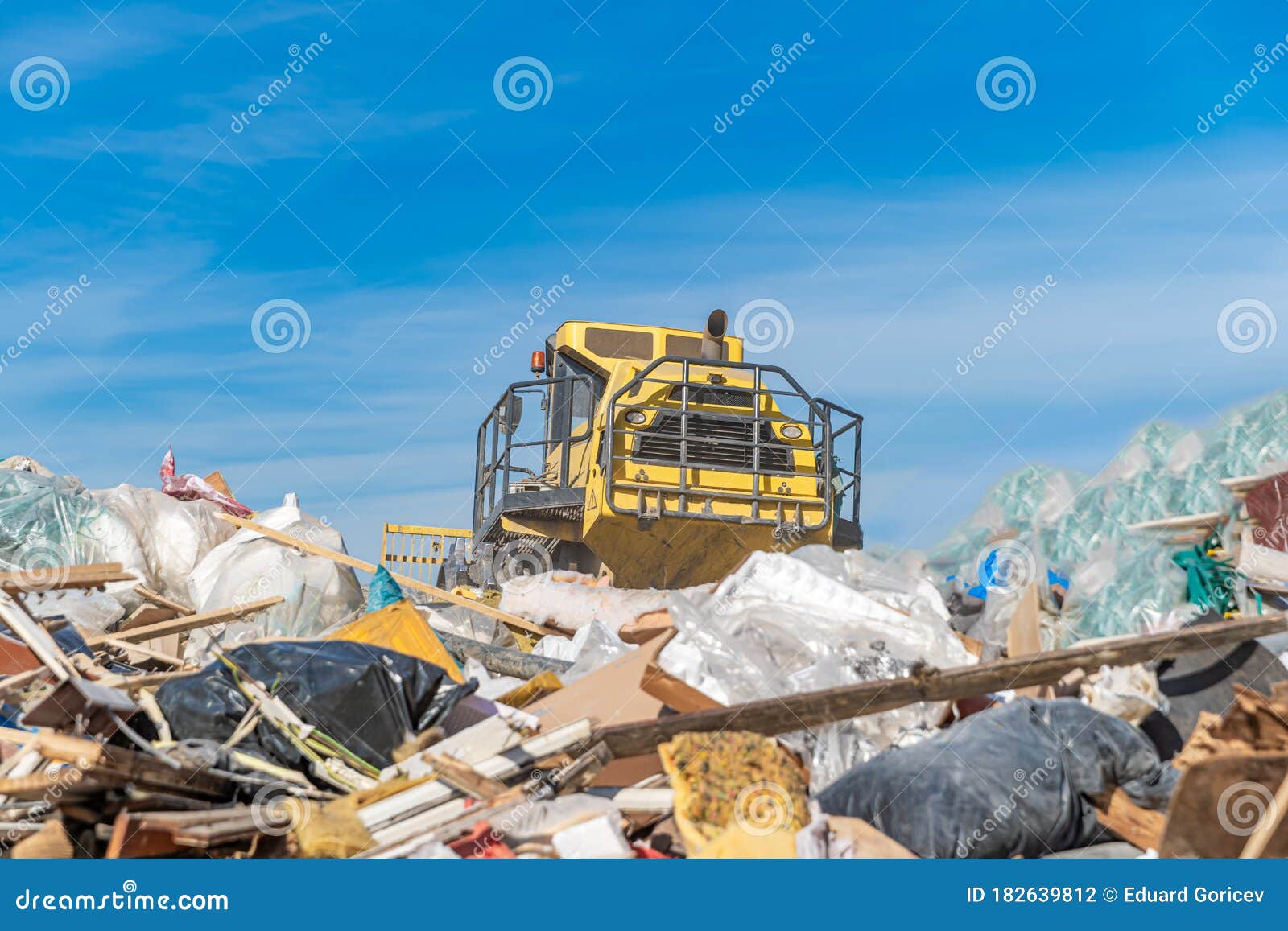 Compactor Processes Waste at a Landfill Stock Photo - Image of ...