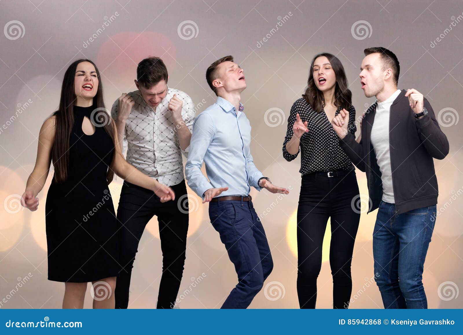 The Company of Young People Singing Stock Photo - Image of person ...