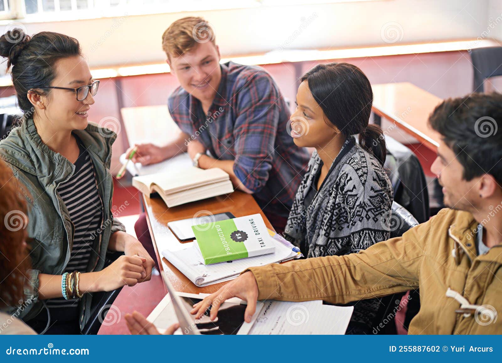 Comparing Notes after Class. Overhead Shot of Students Hanging Out ...