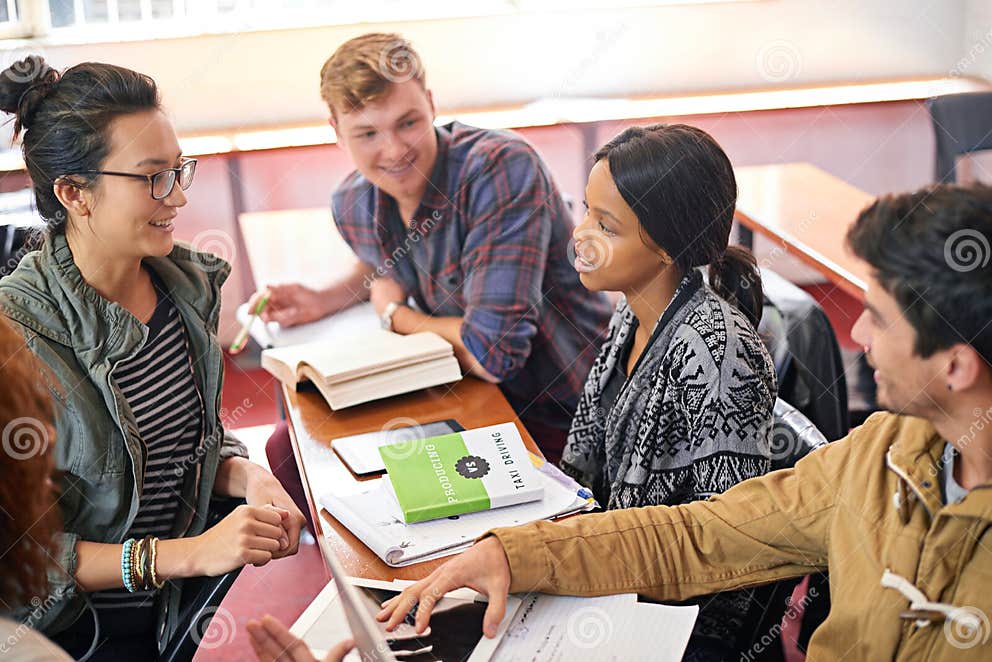 Comparing Notes after Class. Overhead Shot of Students Hanging Out ...