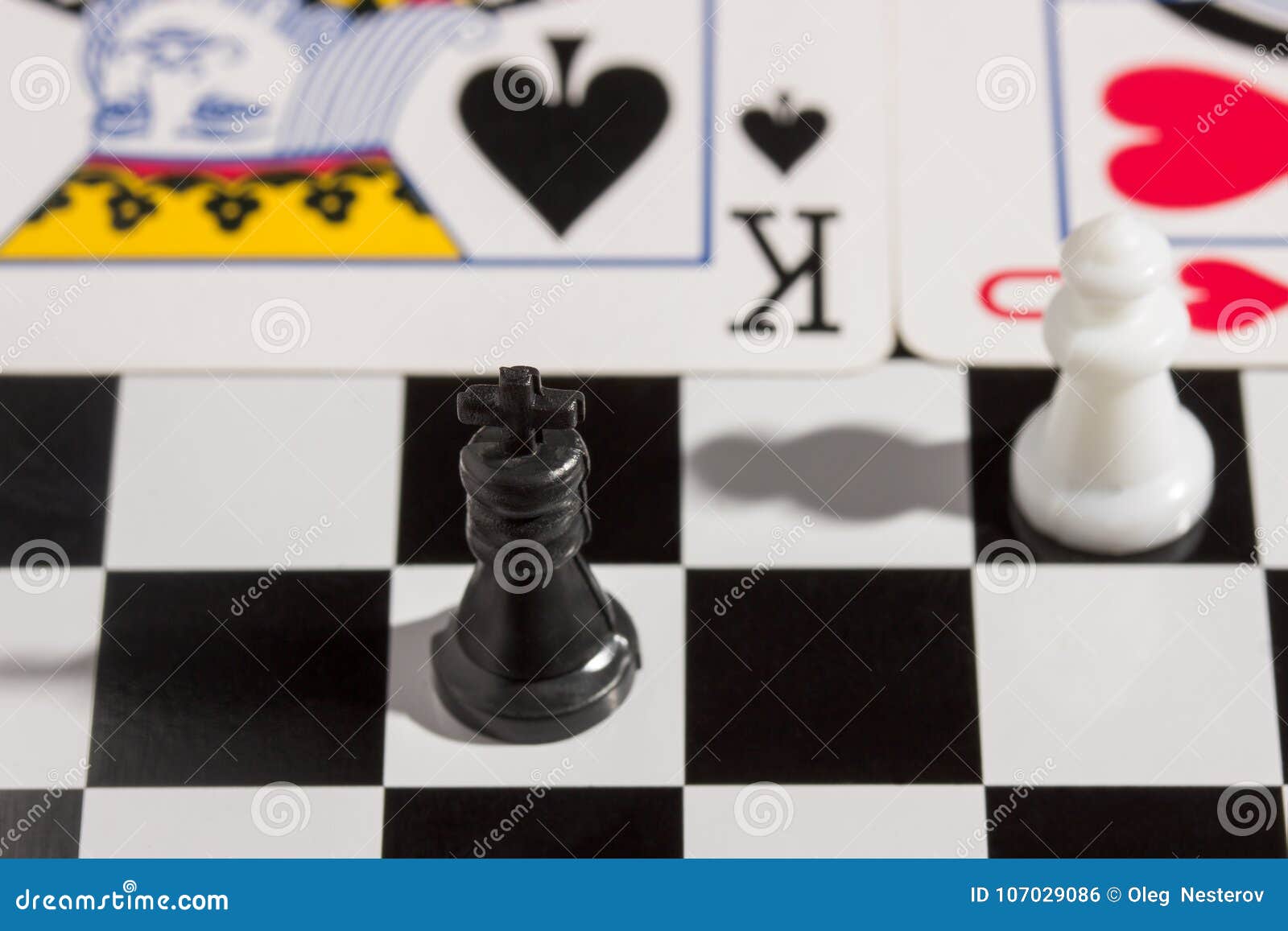 Comparison Of Chess Pieces With Playing Cards Stock Photo ...