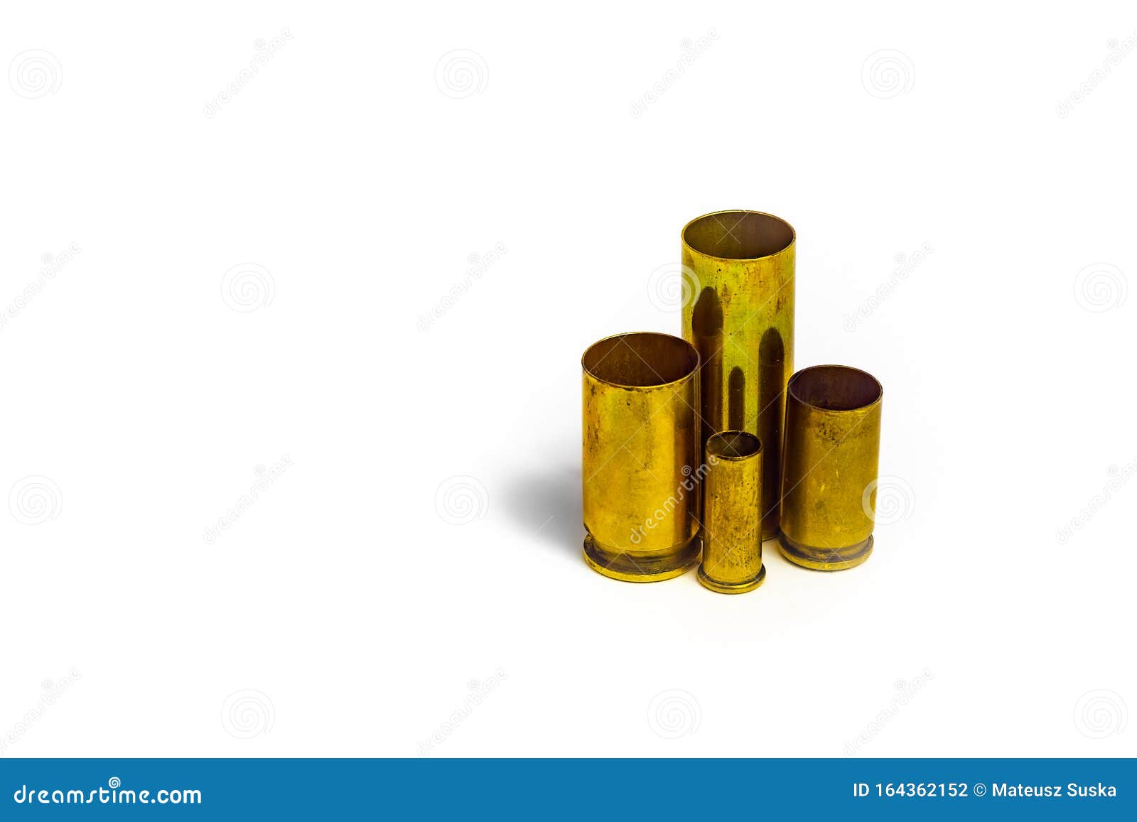 Comparison of Sizes of Different Used Bullet Shells on a White Isolated ...