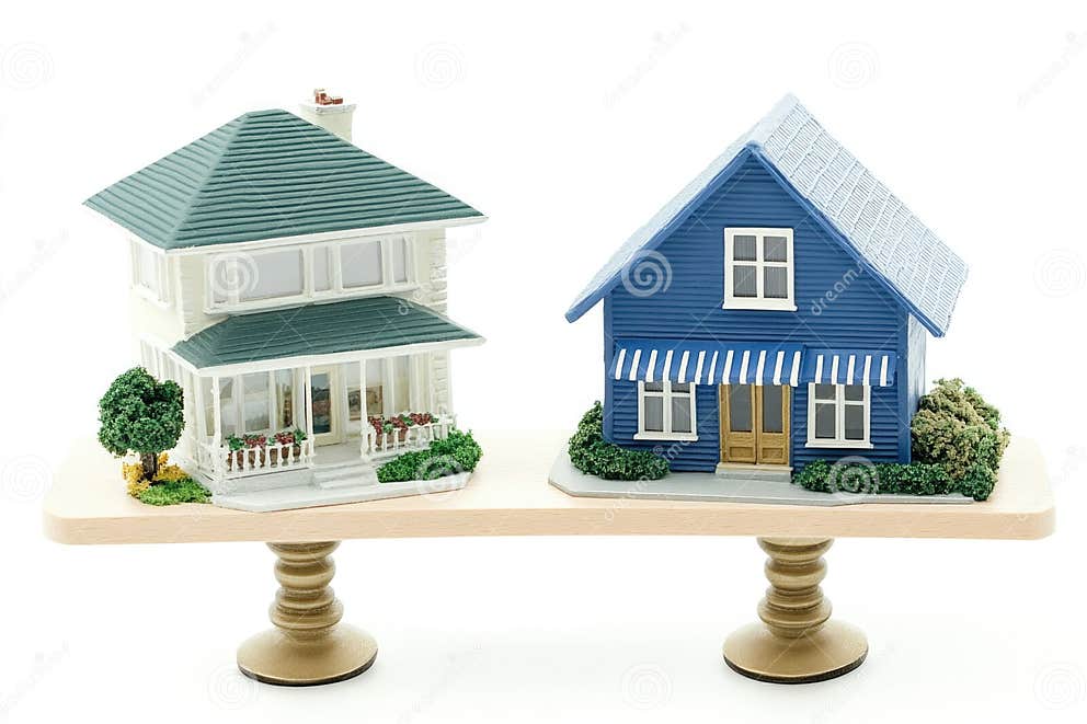 Comparison of Two Different Style Houses on Balancing Scale Platform ...