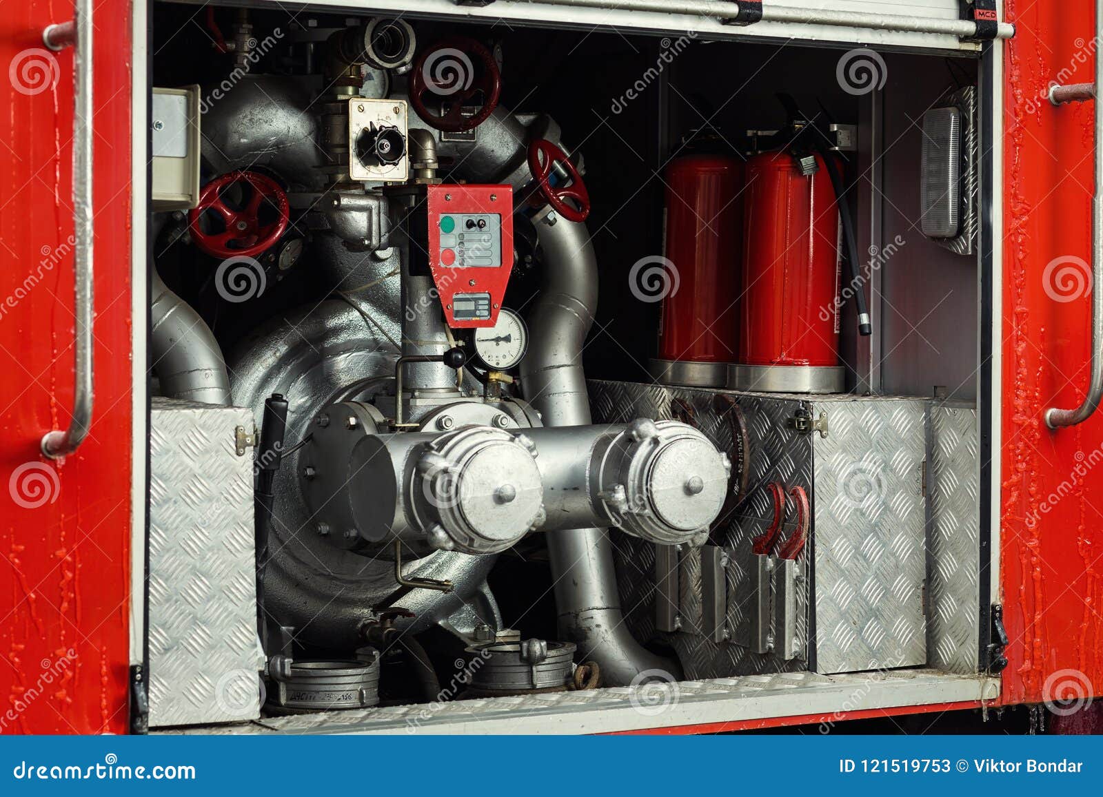 Compartment of Rolled Up Fire Hoses on a Fireengine. Emergency S Stock ...