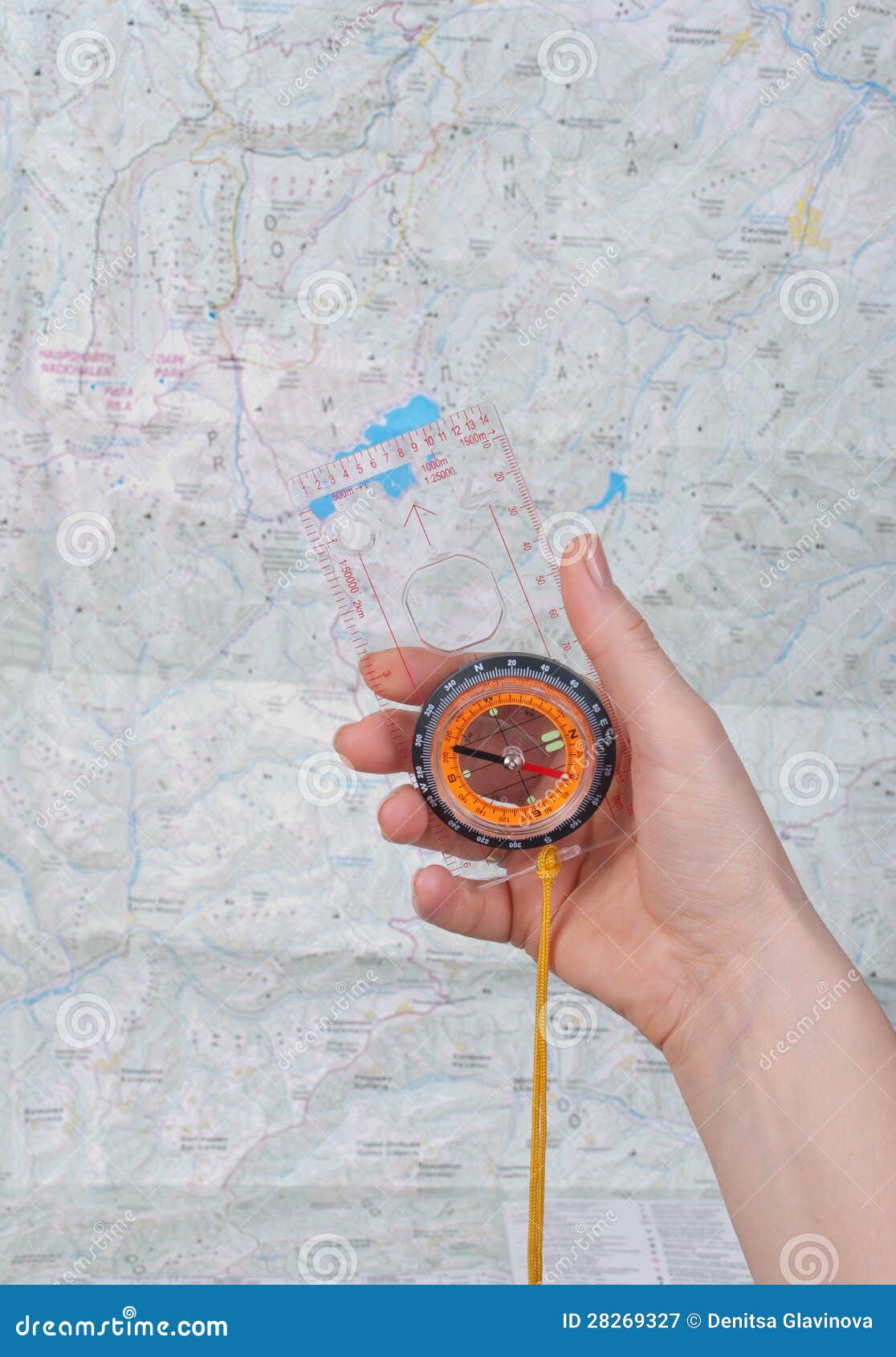 Compas, Map And Hand Royalty-Free Stock Photo | CartoonDealer.com #28269327