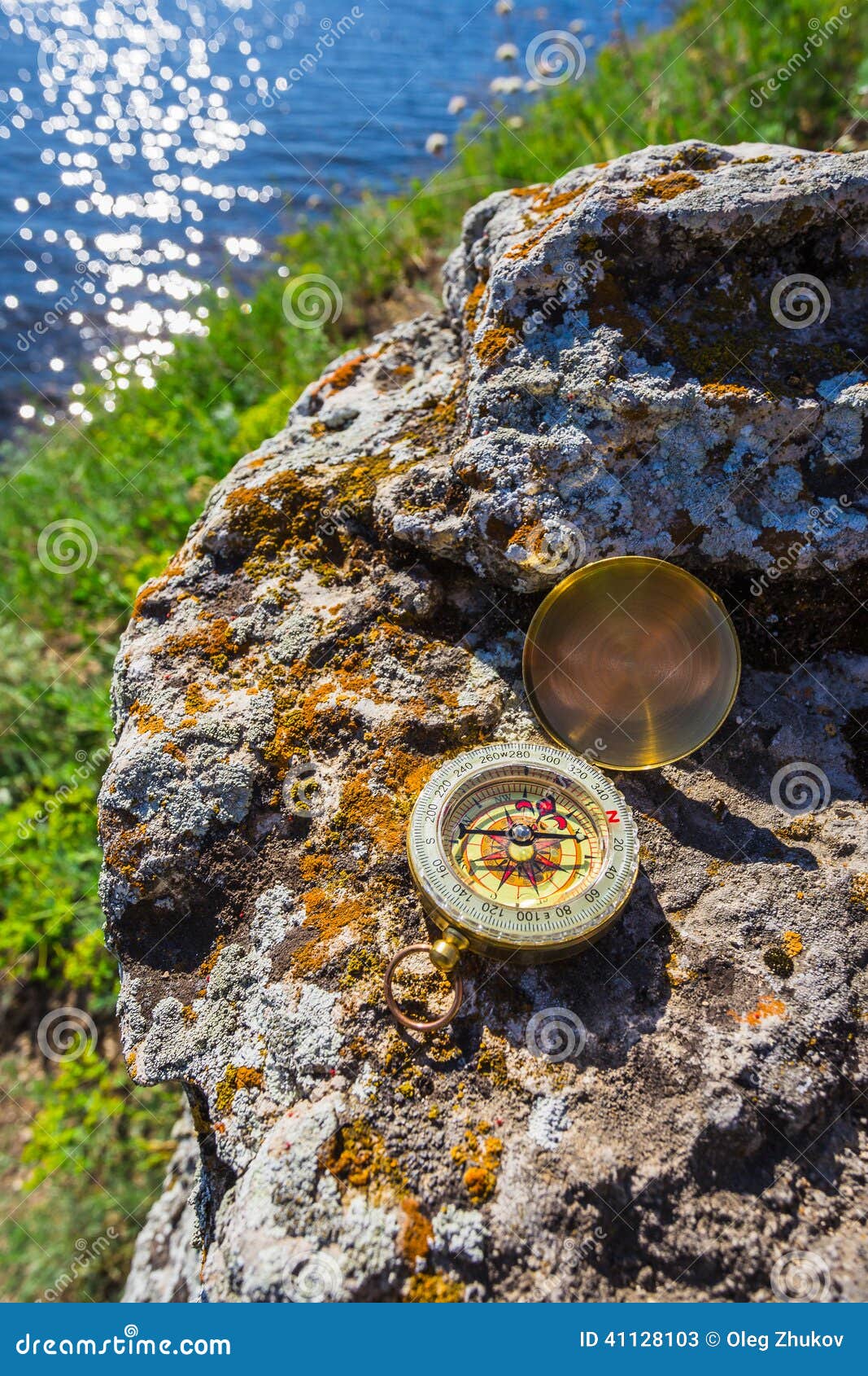 Compass Abandoned on the Rocks Stock Image - Image of metal, concept ...