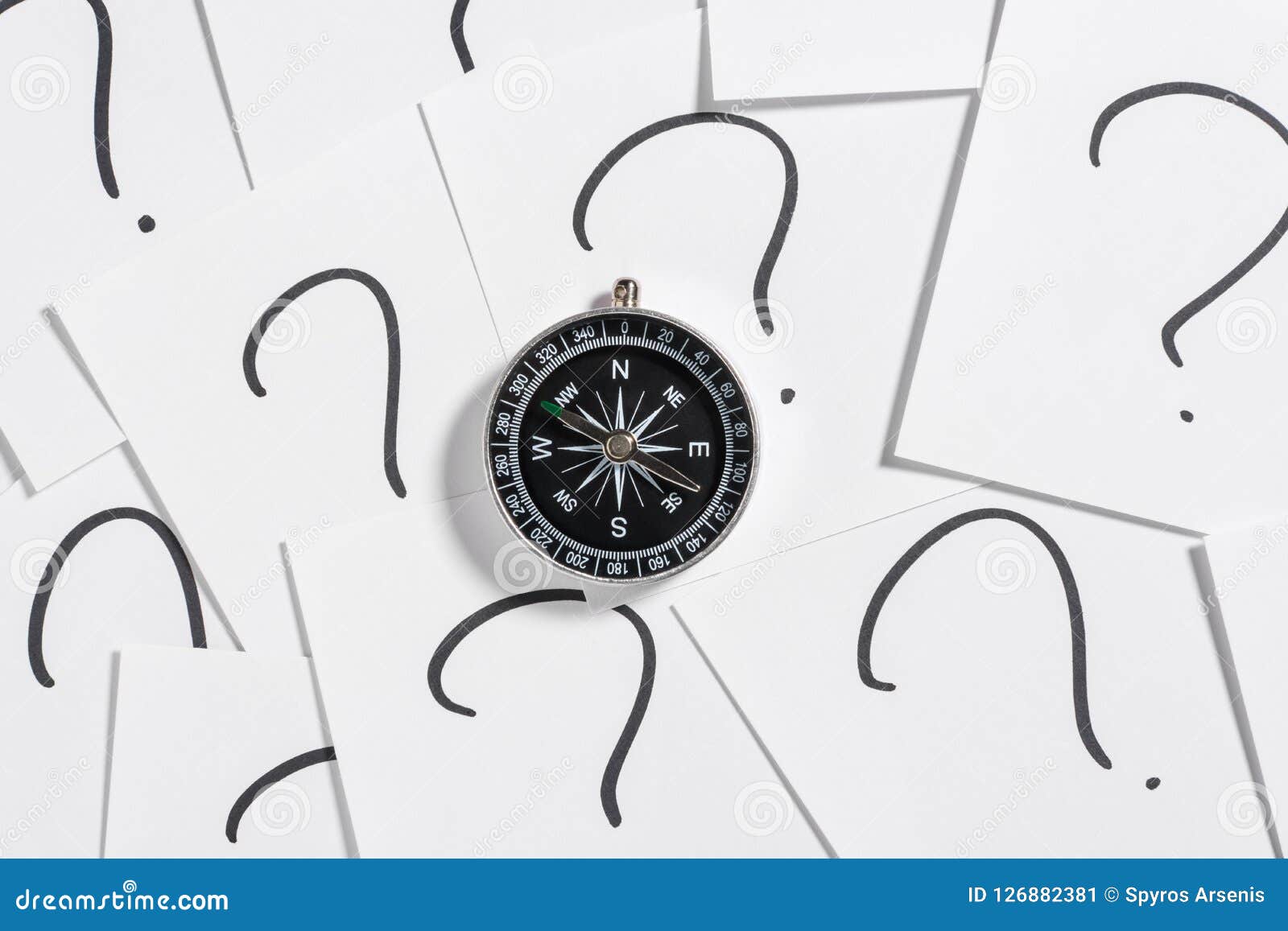 Compass Against White Note Papers with Handwritten Question Mark Stock ...