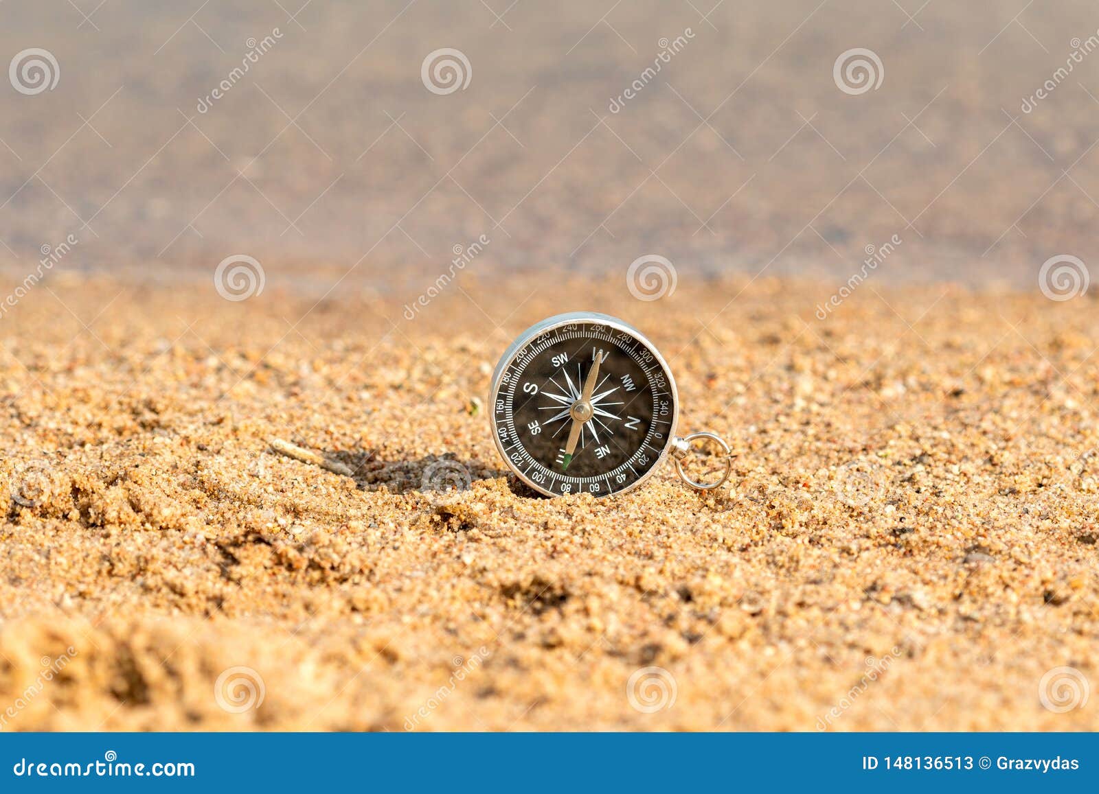 Compass on the beach stock image. Image of journey, coast - 148136513