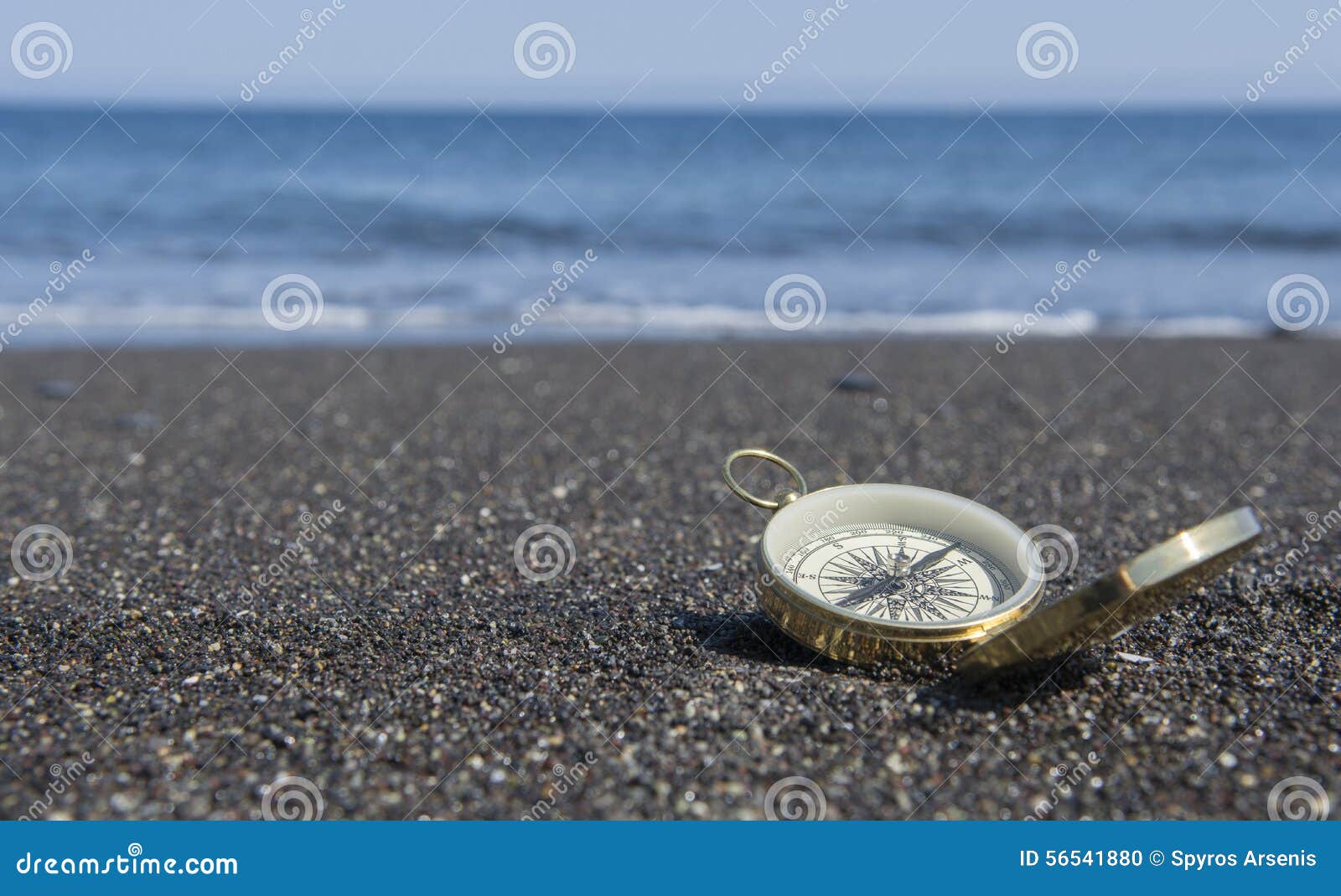 Compass on the Beach stock photo. Image of holiday, compass - 56541880