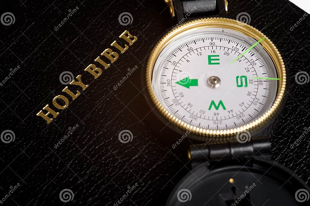 Compass on Bible stock image. Image of directional, south - 6048421