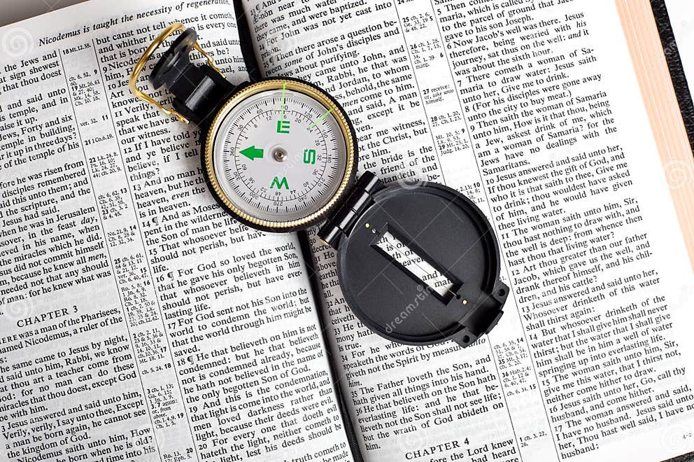Compass on Bible stock image. Image of engineer, ribbon - 6048429