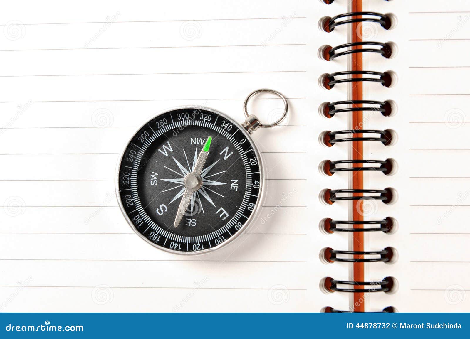 Compass on blank notebook stock photo. Image of notebook - 44878732
