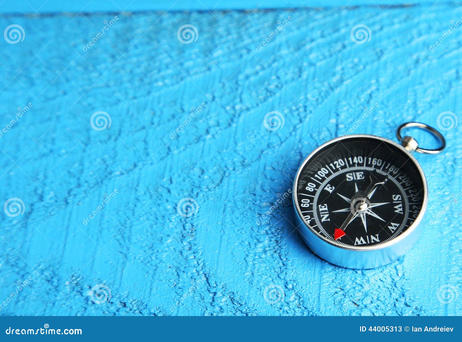 Compass on Blue Wooden Background Stock Image - Image of blue, quality ...