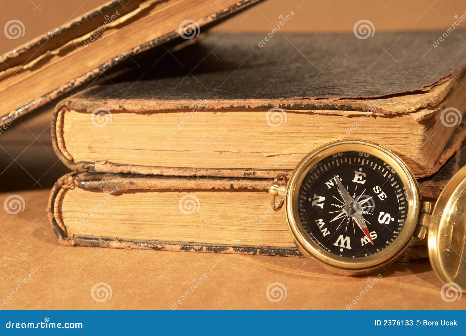Compass and books stock image. Image of search, direction - 2376133