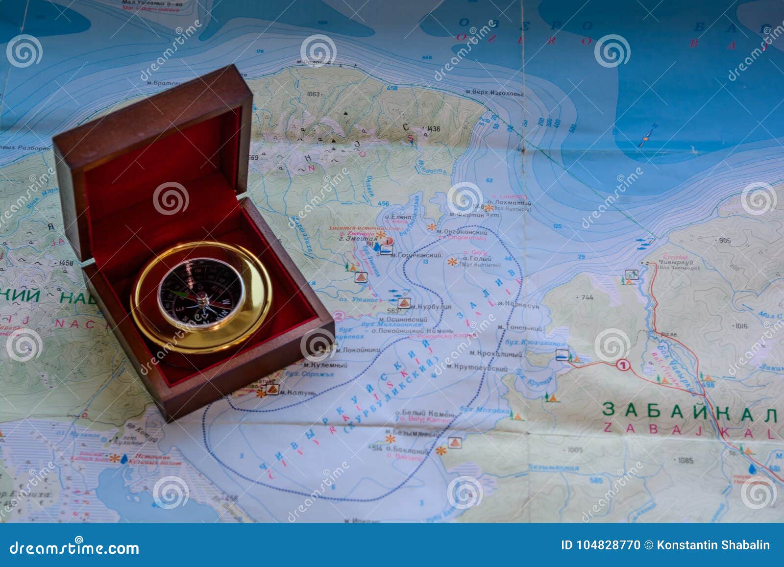 Compass in a Box on the Map Stock Photo - Image of metal, east: 104828770
